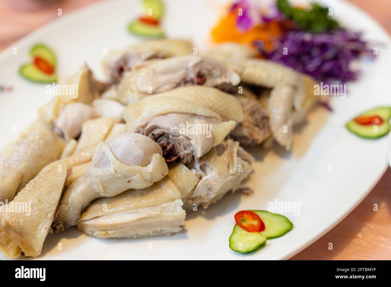 Steamed chicken chopped into pieces Stock Photo - Alamy