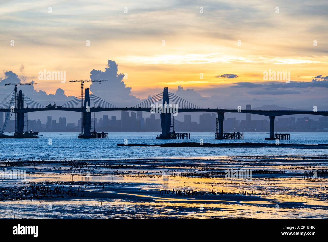 Kinmen Bridge under construction in Taiwan at sunset Stock Photo - Alamy