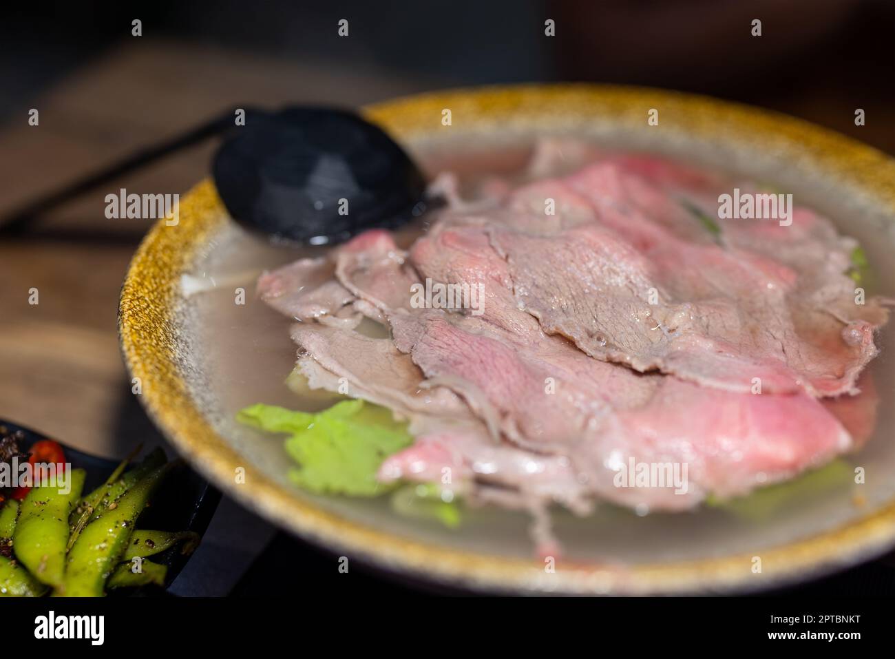 Rice noodle with slice of raw beef, famous cuisine in Kinmen of Taiwan ...