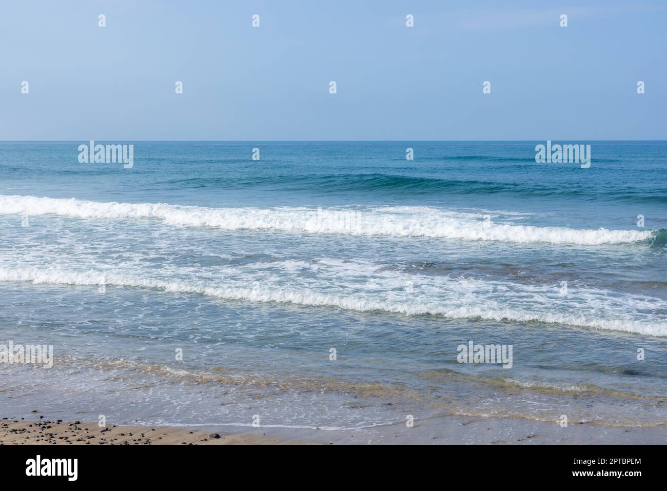 Sea wave splash over the beach Stock Photo - Alamy