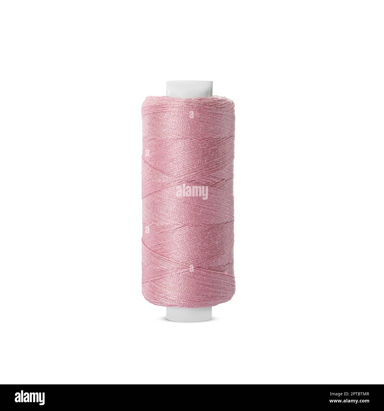 Spool of pink sewing thread isolated on white Stock Photo - Alamy