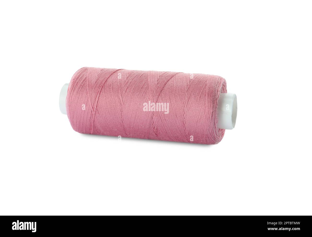 Spool of pink sewing thread isolated on white Stock Photo - Alamy