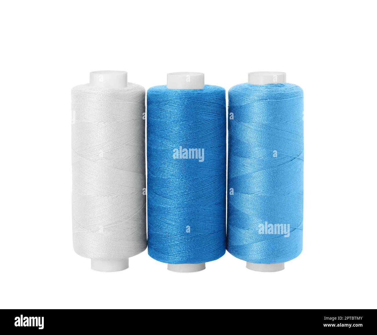 Different colorful sewing threads on white background Stock Photo - Alamy