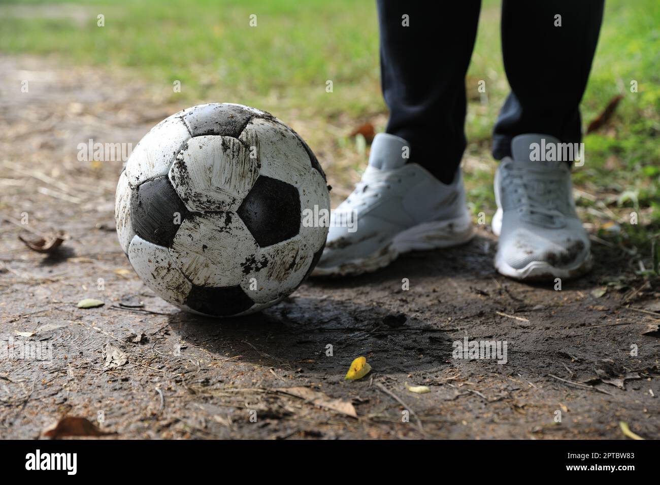 Dirty soccer ball hi-res stock photography and images - Alamy