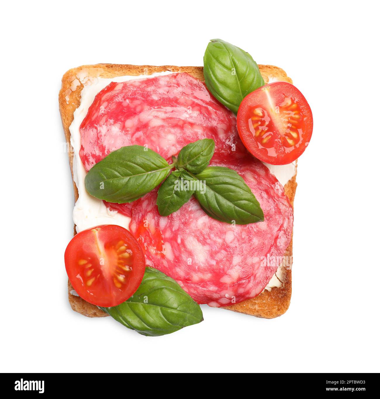 Tasty toast with cream cheese, tomato, salami and basil on white ...