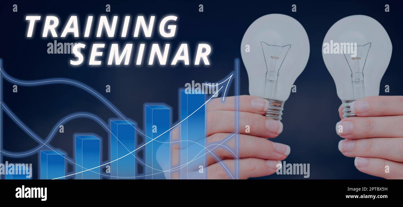 Hand writing sign Training Seminar, Business concept covers the costs ...
