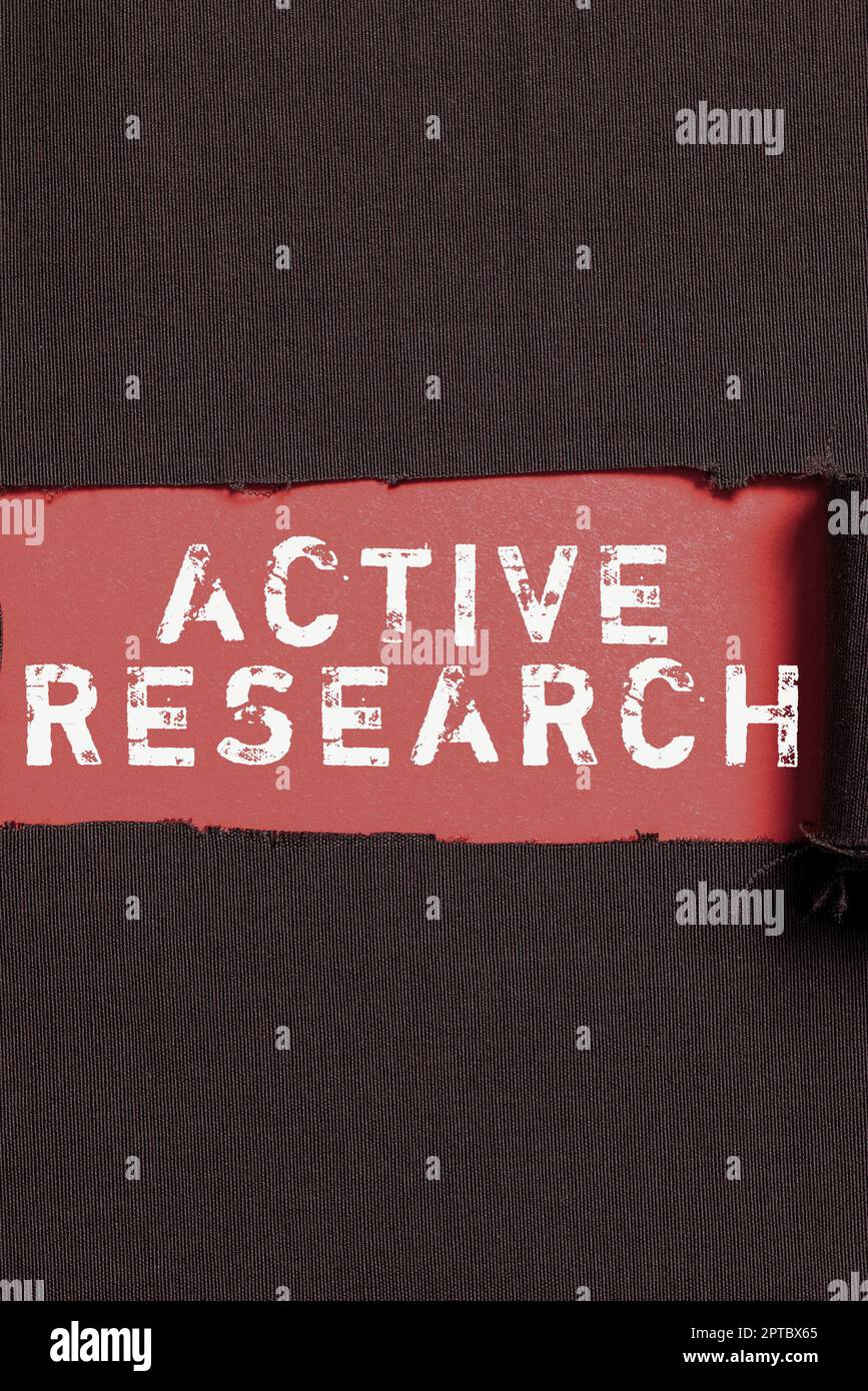 Sign displaying Active Research, Word Written on an exam that you take ...