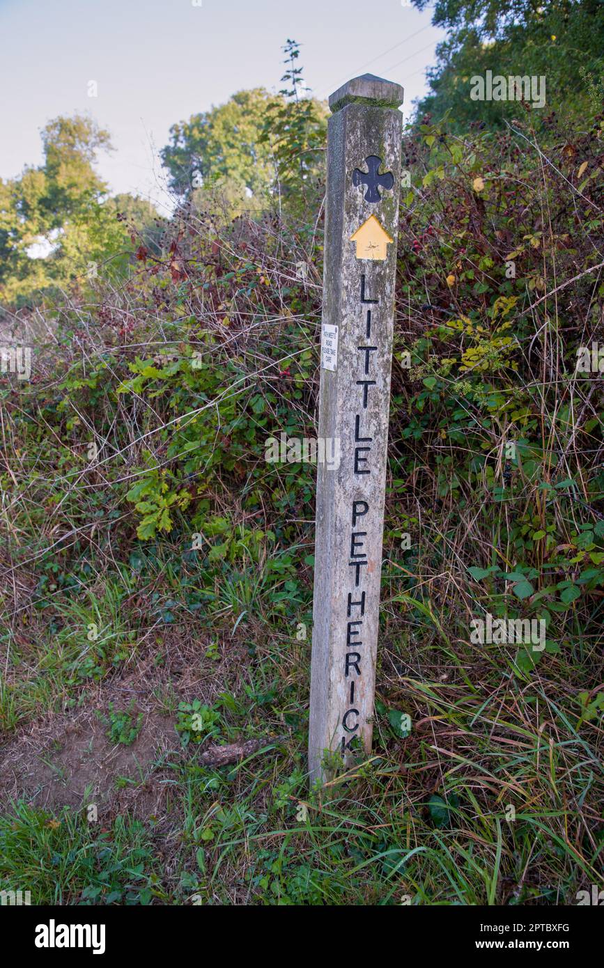 Single signpost shows to Little Petherick near St Issey in Cornwall, UK ...