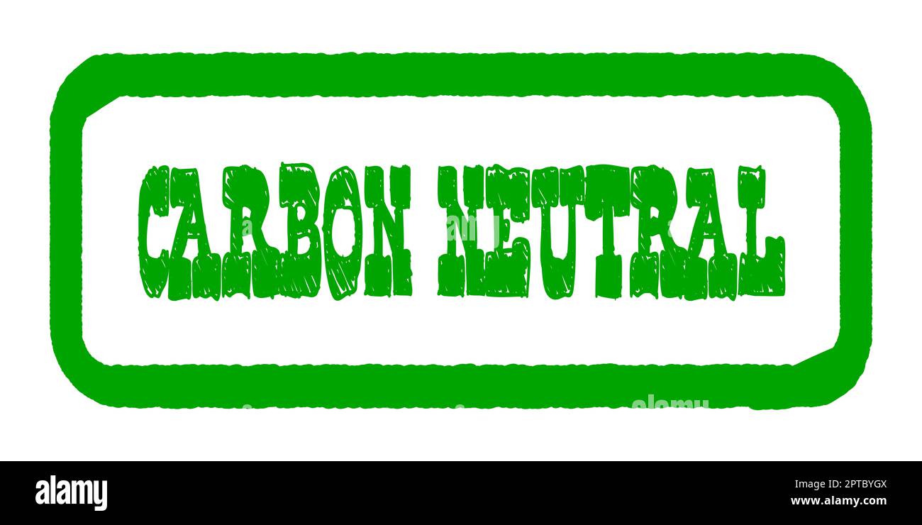 A green rubber ink stamp mark stating Carbon Neutral over a white ...