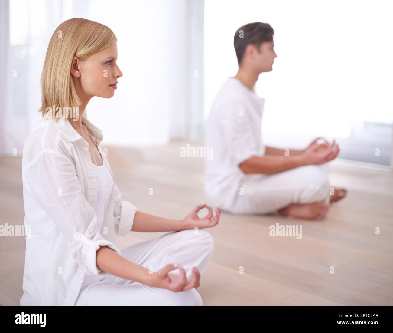 On their way to enlightenment...Two people sitting in the lotus ...