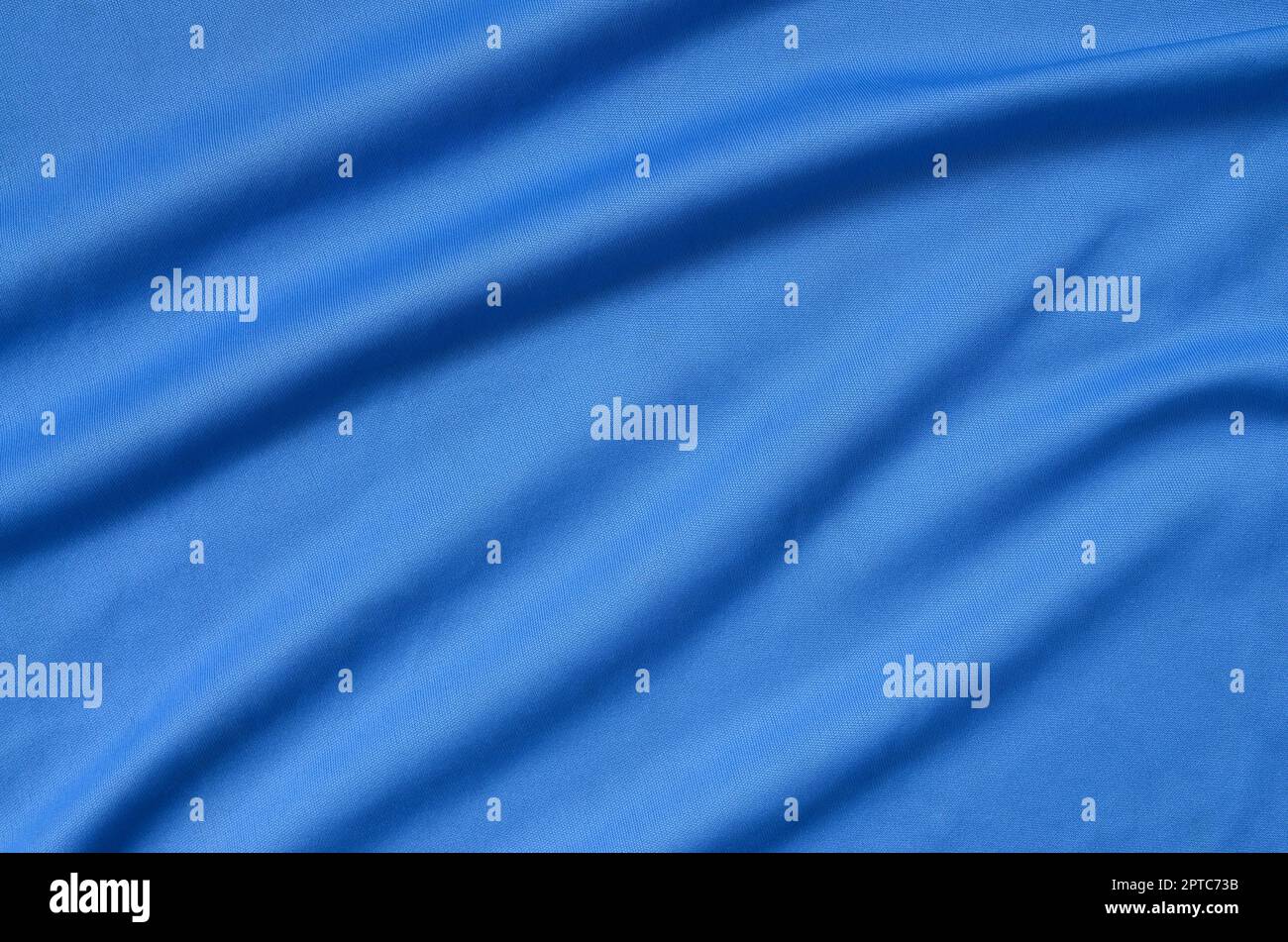 Detailed polyester blue fabric texture with many long folds Stock Photo ...