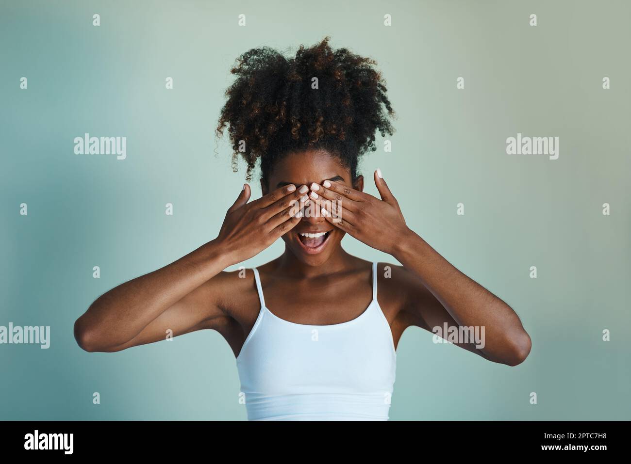 Show your fro, no more hiding your natural beauty. Studio shot of a ...