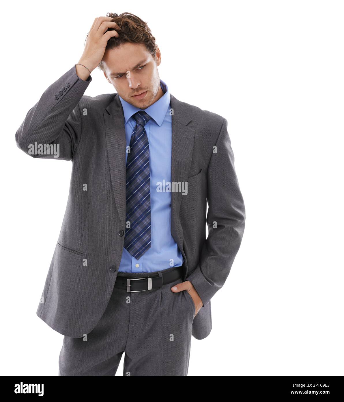 Wondering what the future holds. A worried businessman against a white ...