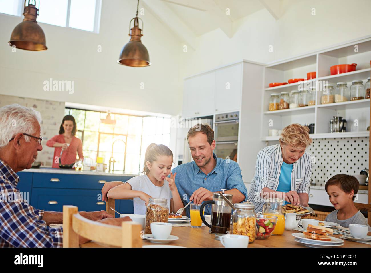 Life starts after breakfast. a multi generational family enjoying ...