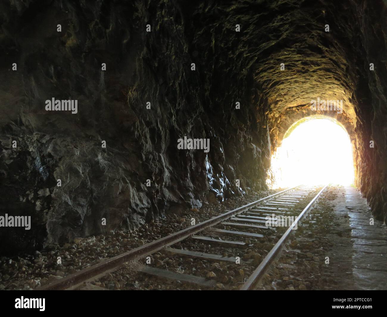 iron road bridges metal rail light at the end of the tunnel train ...