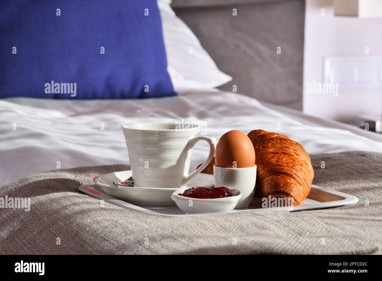 Breakfast on tray in bed in hotel room Stock Photo - Alamy