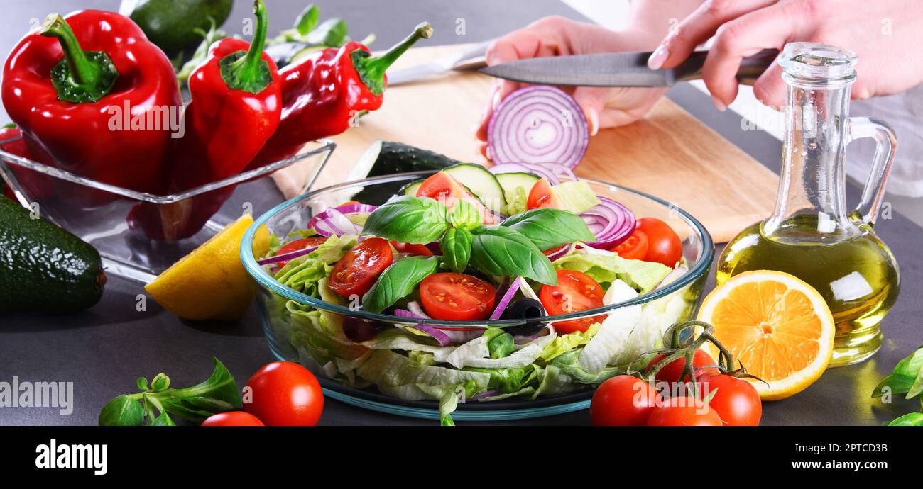 Preparation of a vegetable salad from fresh organic ingredients Stock ...