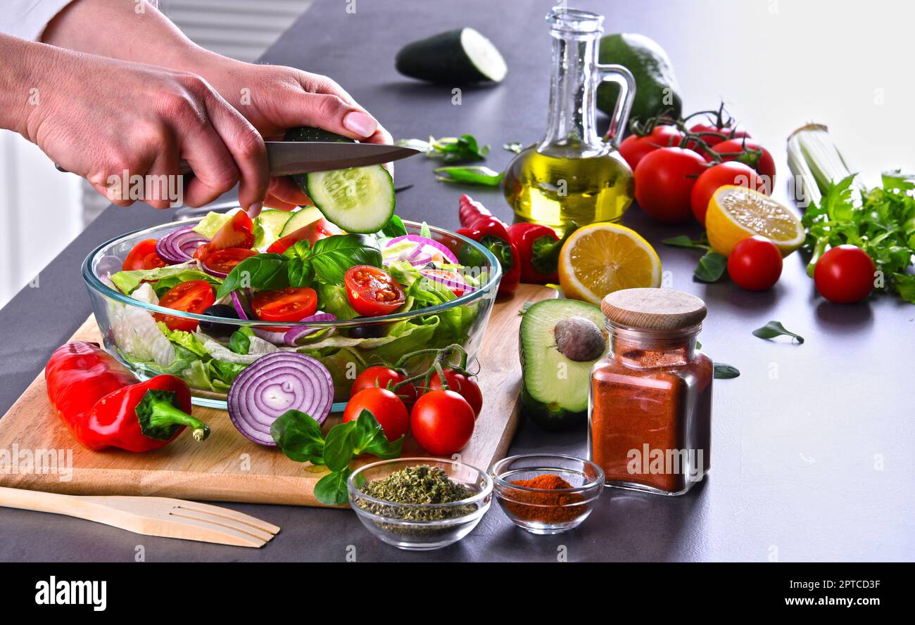 Preparation of a vegetable salad from fresh organic ingredients Stock ...
