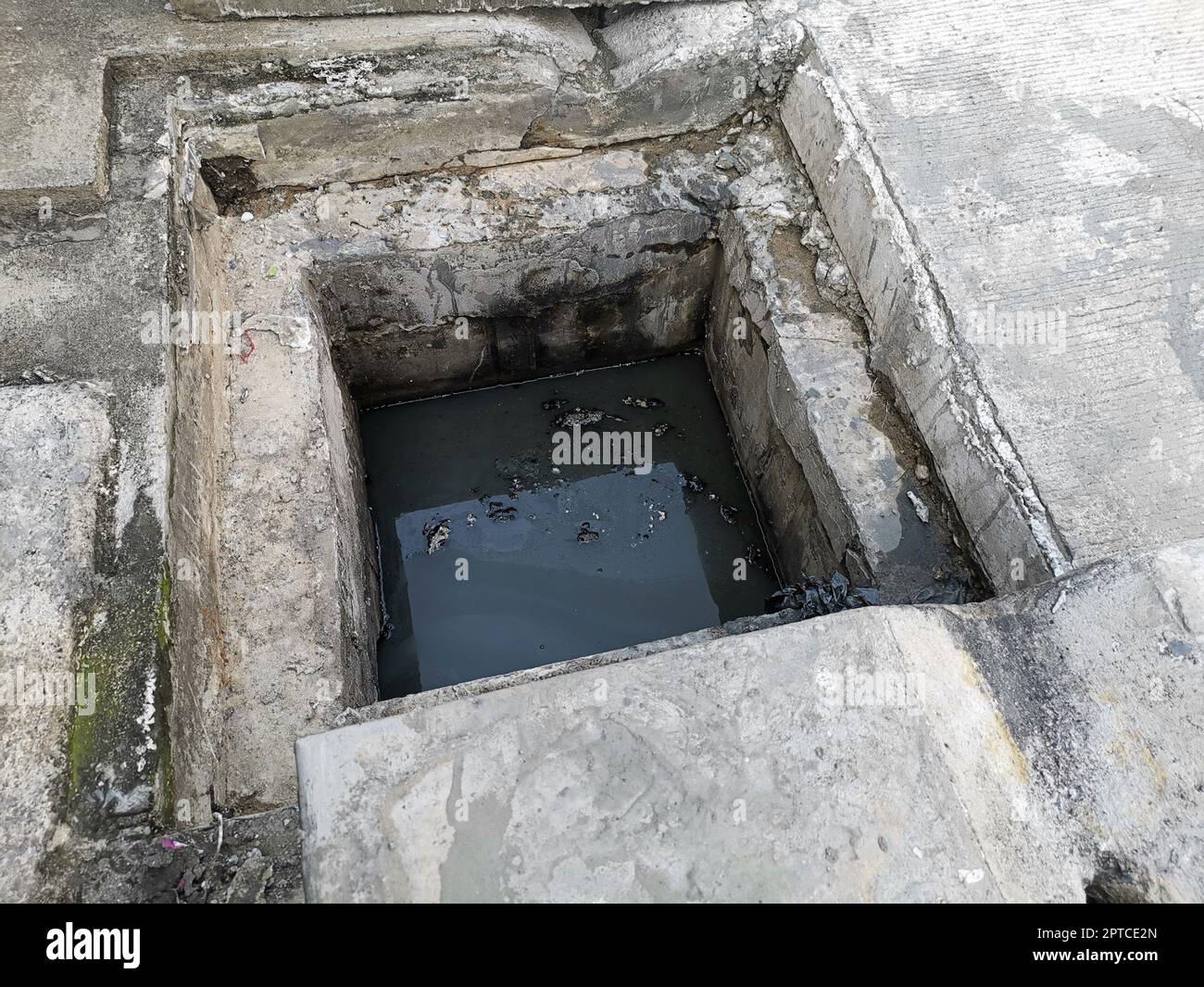 Manhole cover open in street and repair of roads. Accident with sewer ...