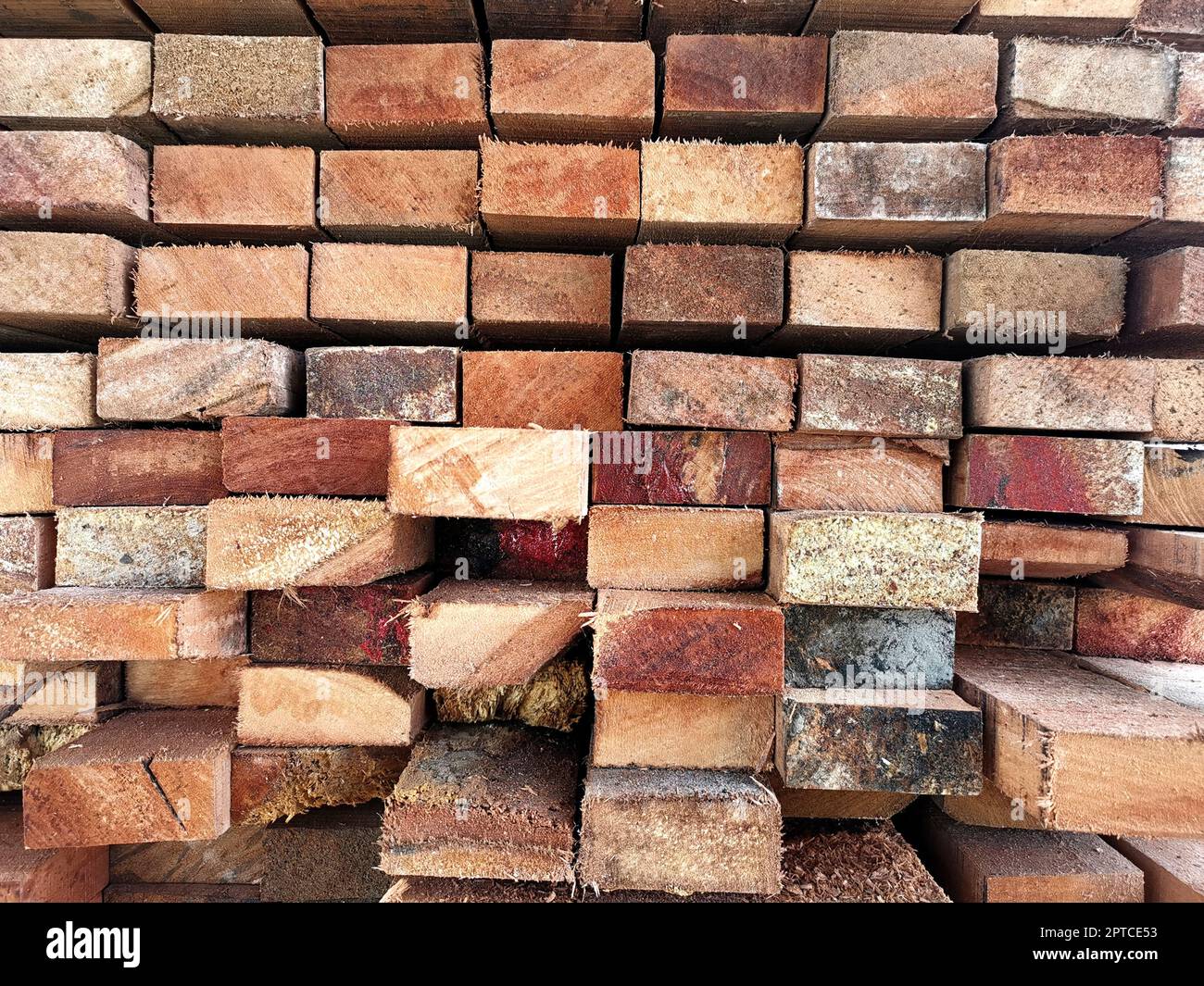 Background of Stacked Wood Cut in Squared Timber Stock Photo - Alamy