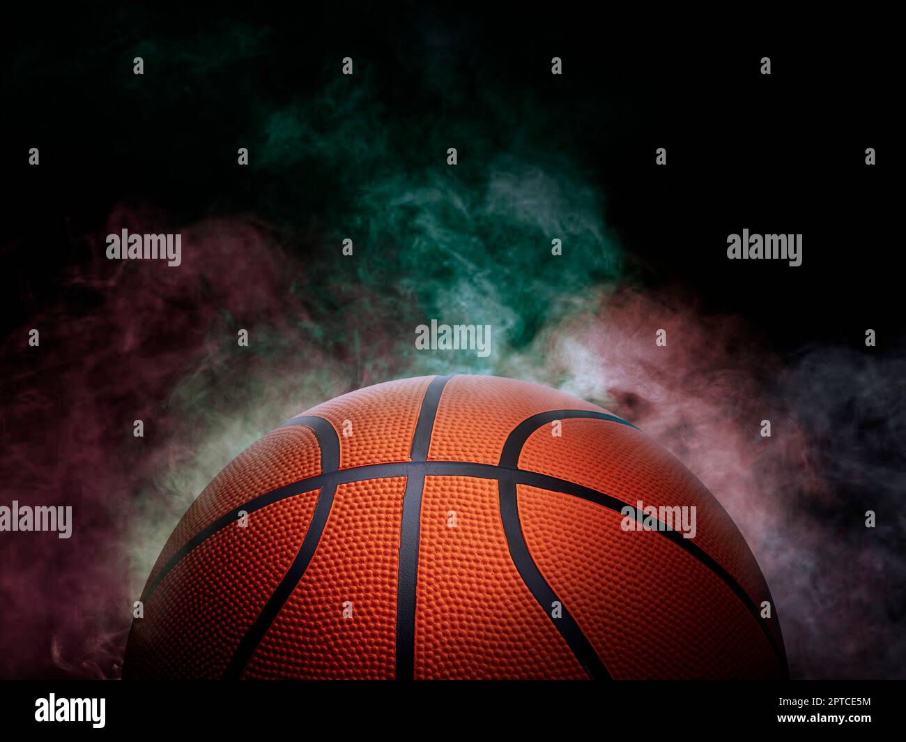 basketball on the color smoke background Stock Photo - Alamy