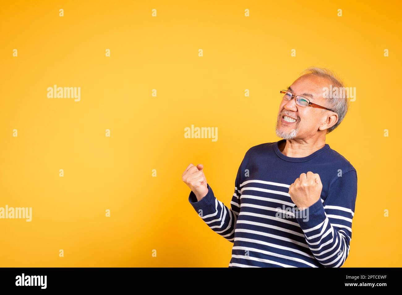 Old man arms raised hi-res stock photography and images - Alamy