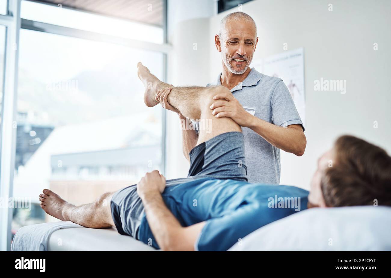 Well heal your injury in no time. a physiotherapist treating a patient ...