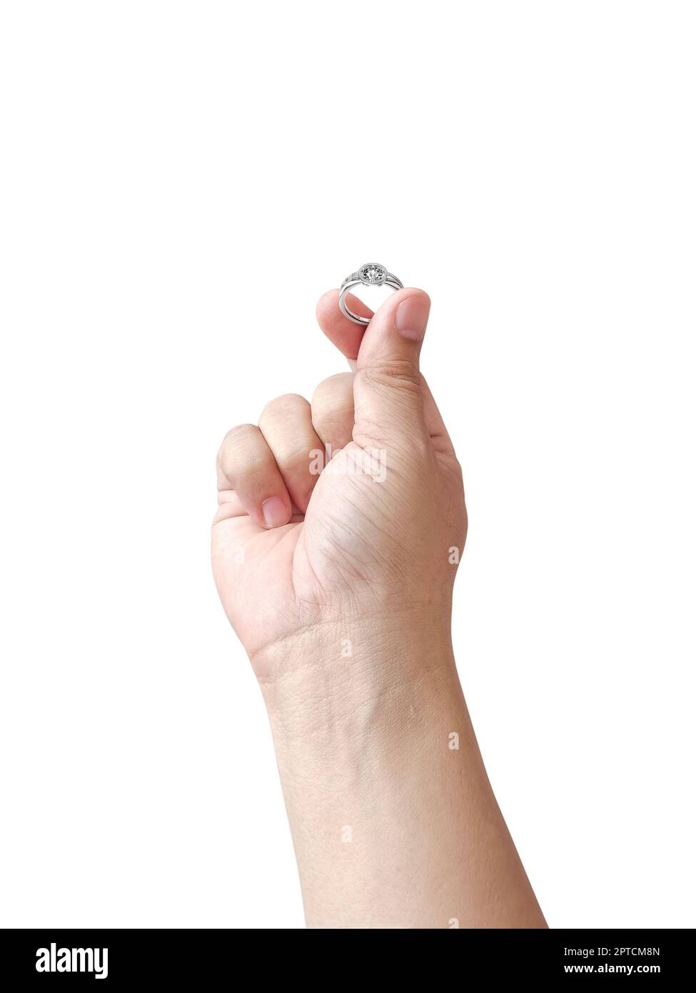 Hand holding diamond ring isolated on white background Stock Photo - Alamy