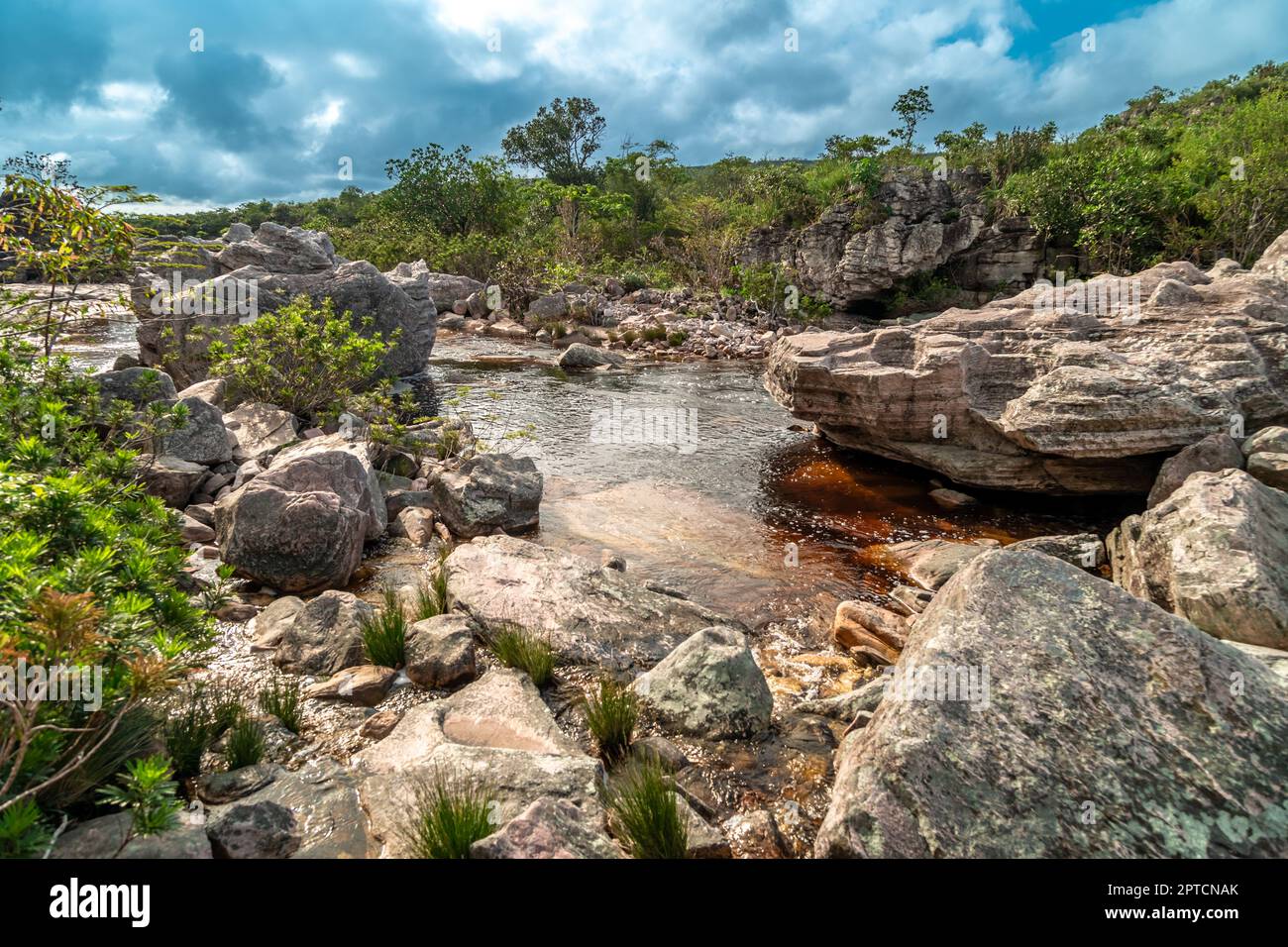 A mountain river flows through rocks in South America Stock Photo - Alamy
