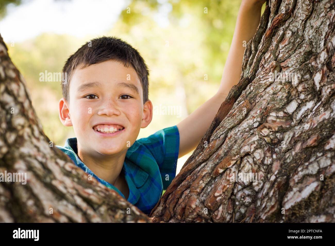 Outdoor portrait of a biracial Chinese and Caucasian boy Stock Photo ...