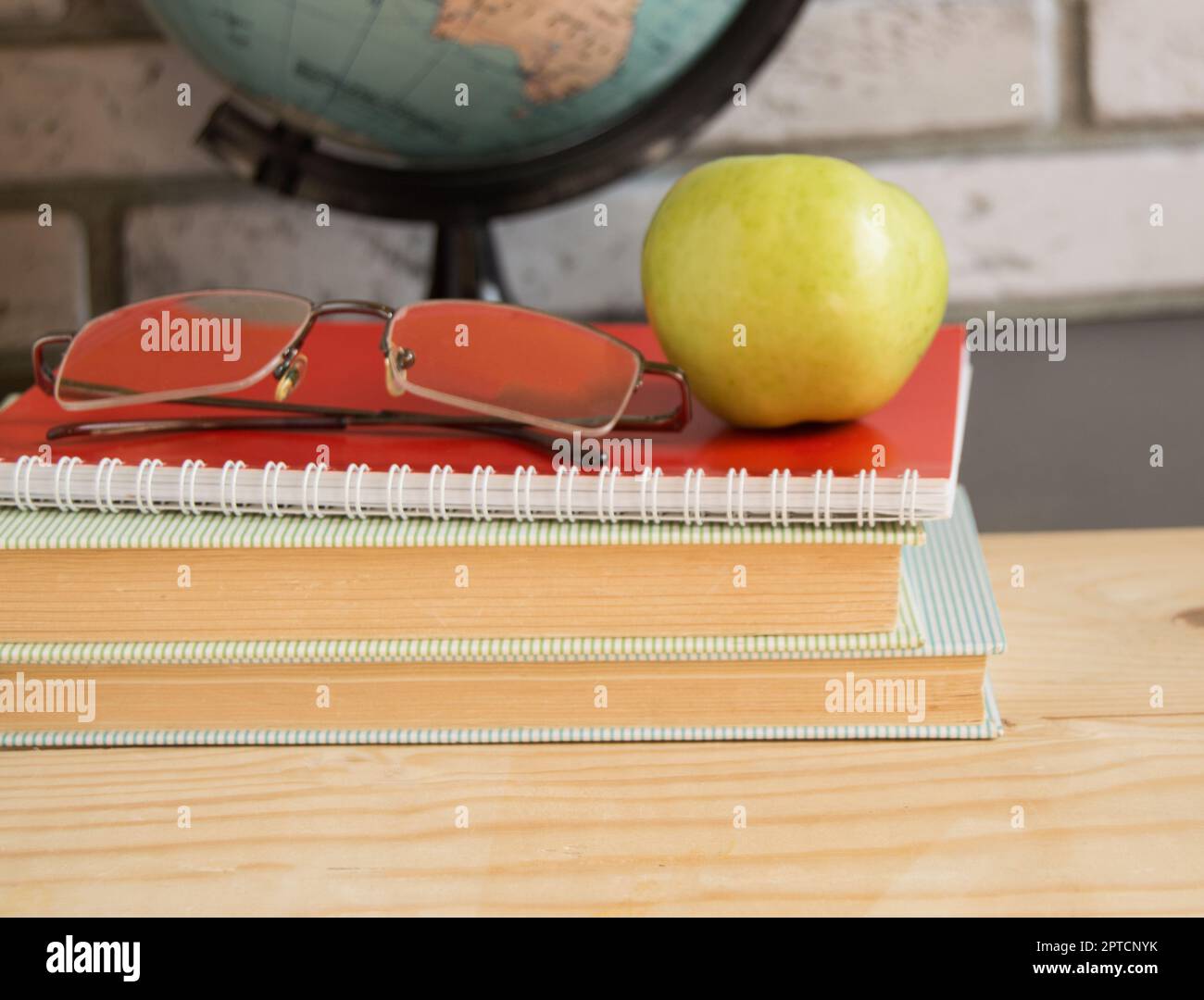 World teachers ' Day in school. Still life with books, globe, Apple ...