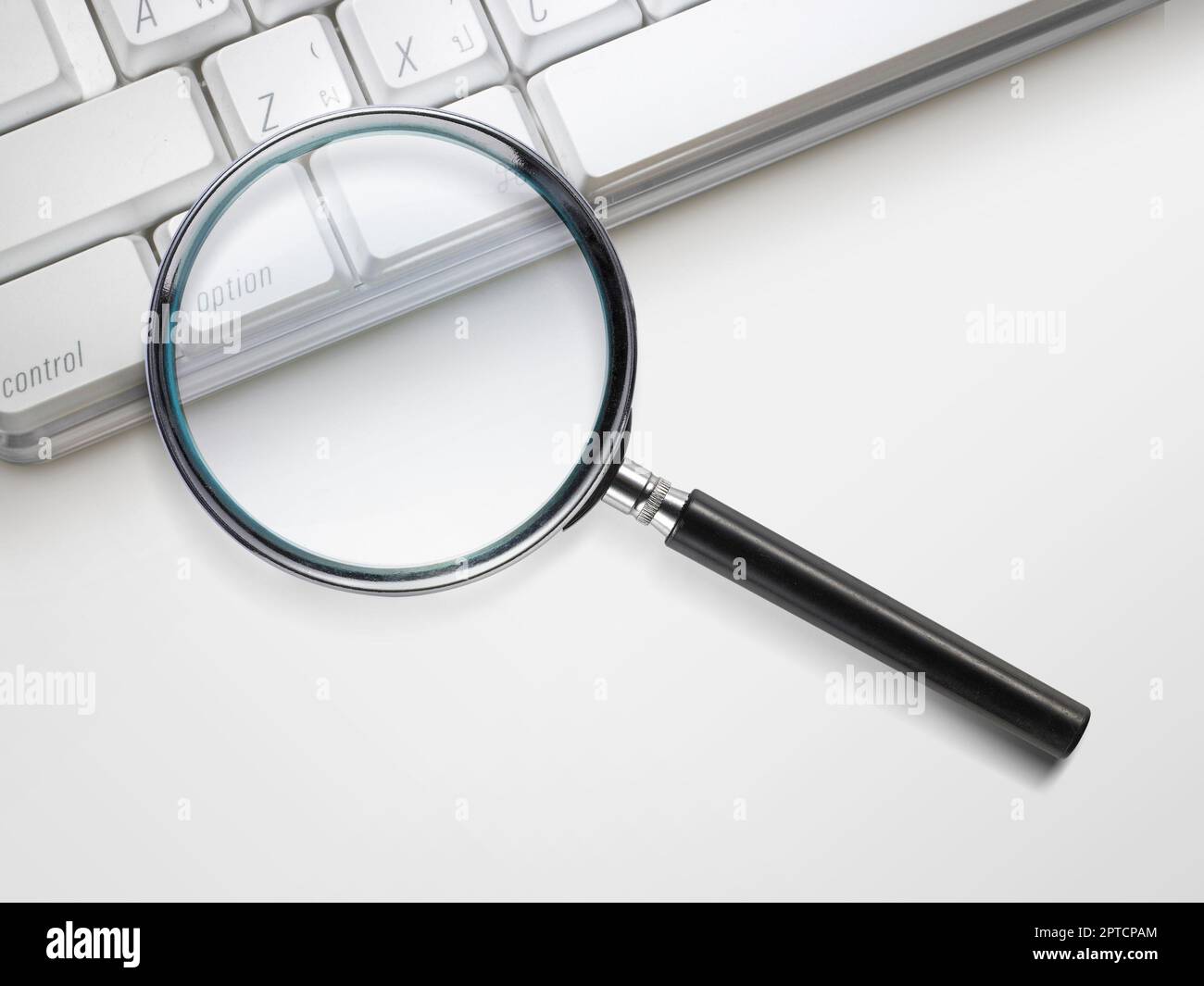 laptop computer with magnifying glass search concept Stock Photo - Alamy