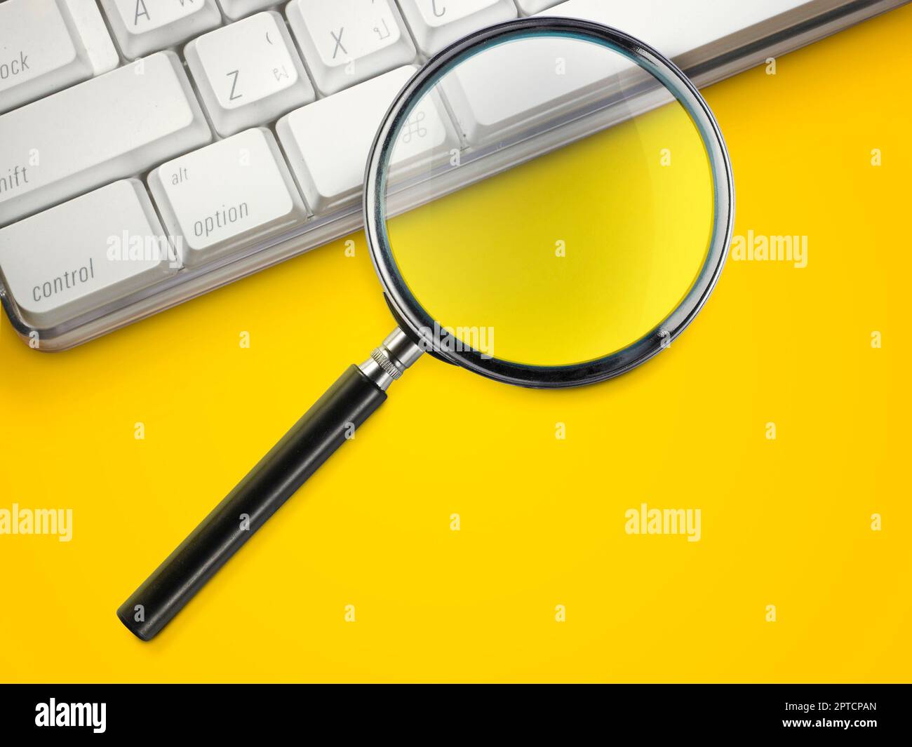 laptop computer with magnifying glass search concept Stock Photo - Alamy
