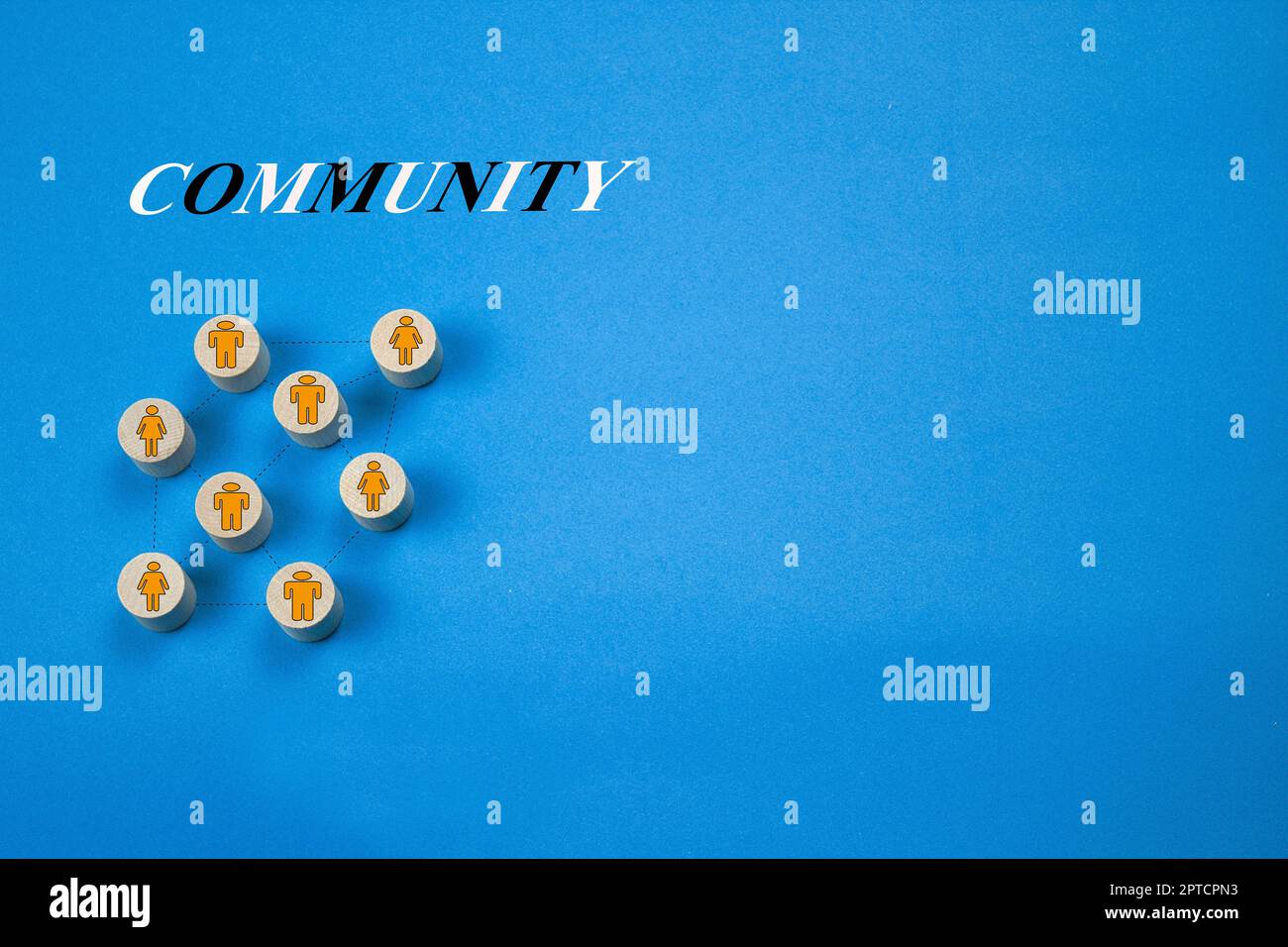 wooden blocks with drawn shapes showing the concept of community and ...