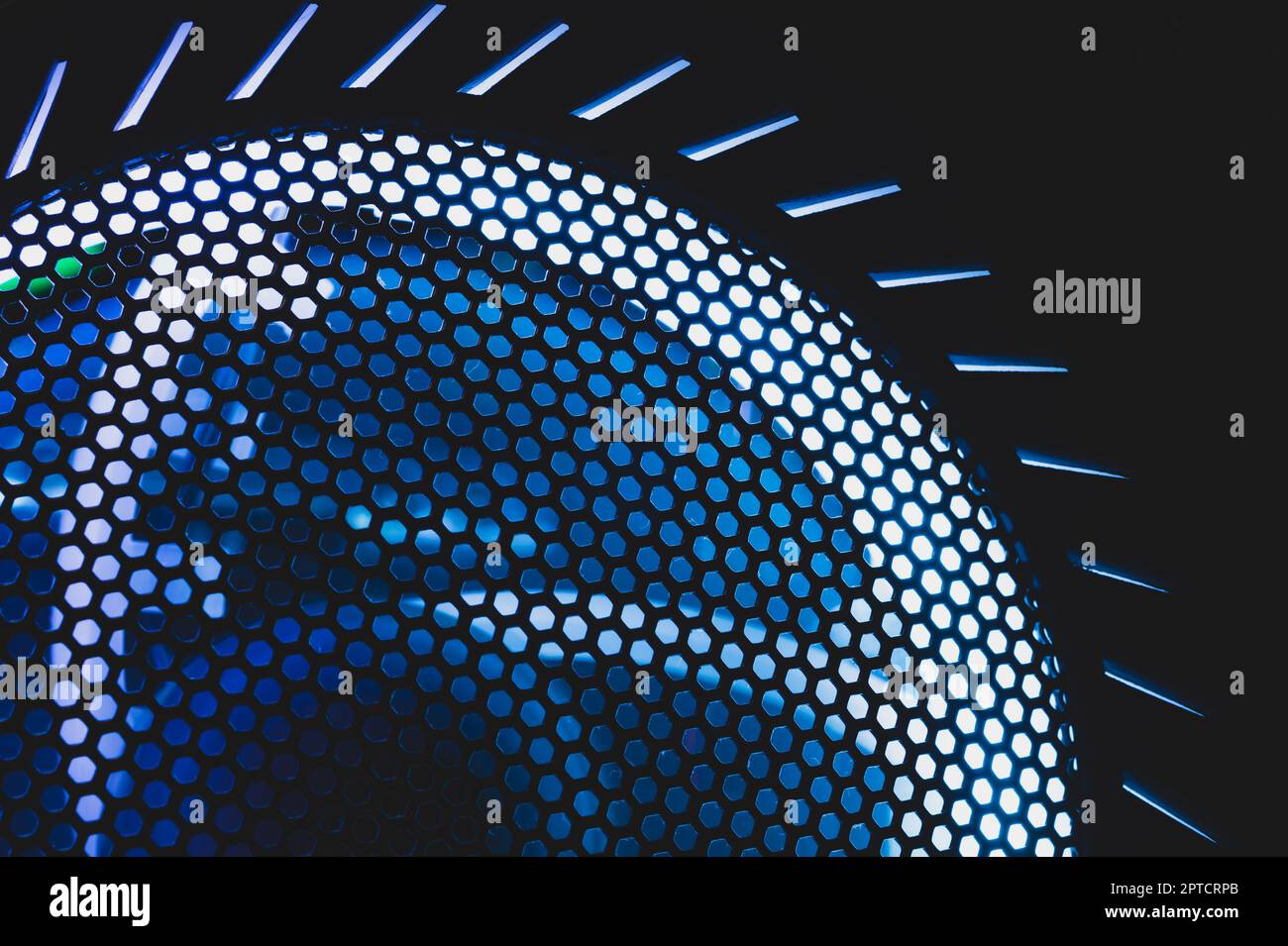 Detail of computer fan with blue color light abstract background ...