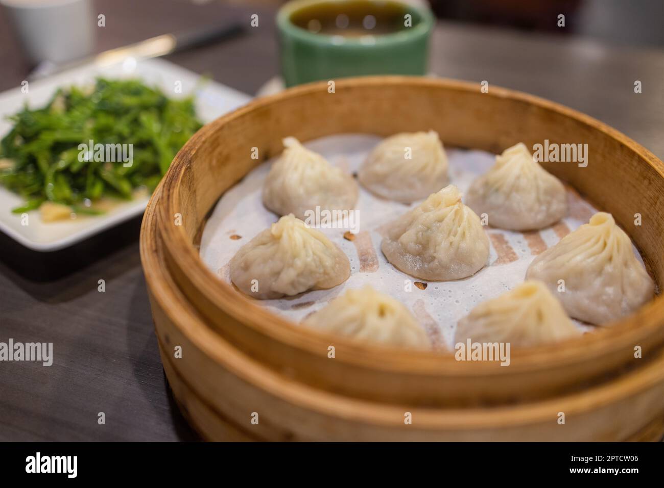 Chinese style steamed soup bun in restaurant Stock Photo - Alamy