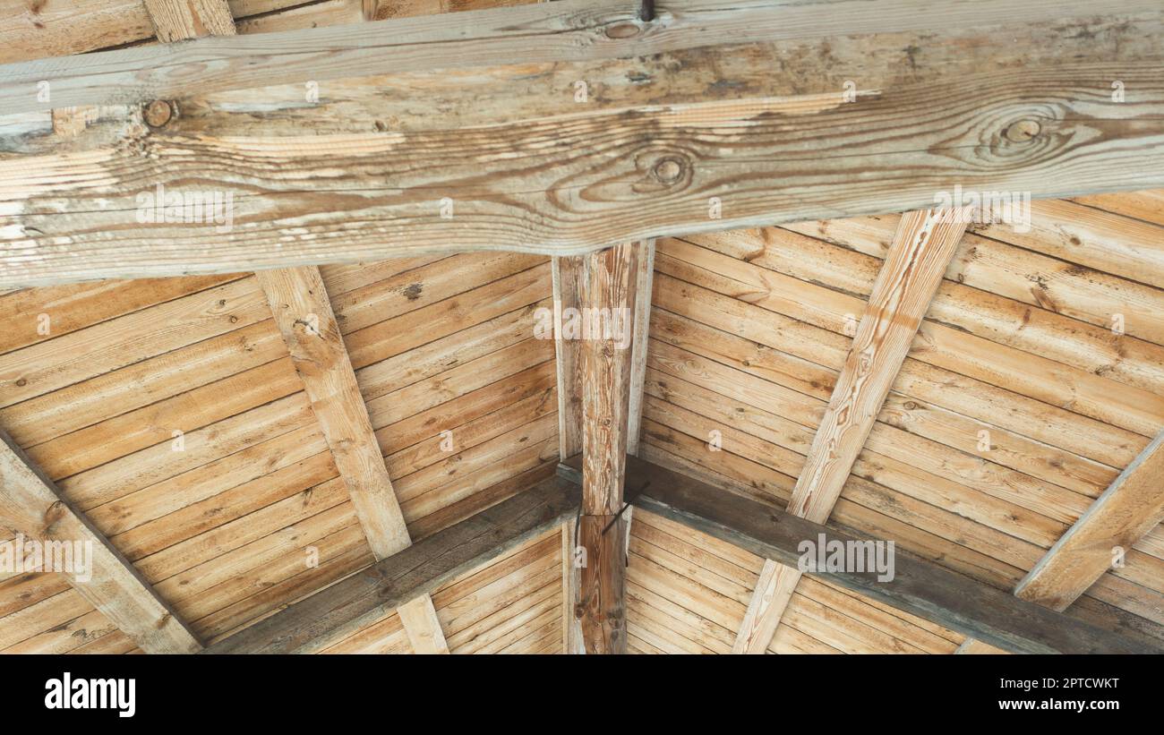 Wooden plank roof construction inside Stock Photo - Alamy