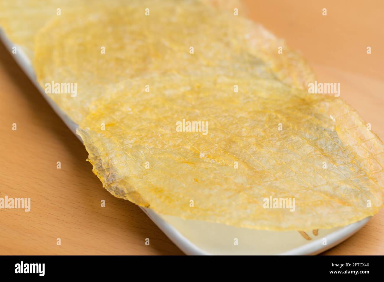Dried fish fillet seafood cuisine Stock Photo - Alamy