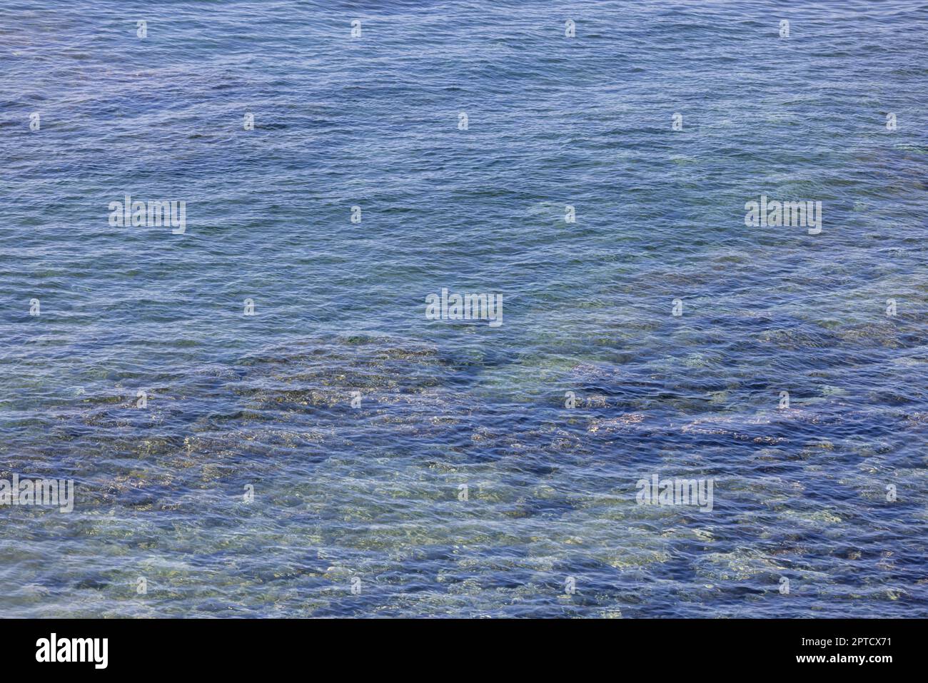 Crystal clear sea water bay Stock Photo - Alamy