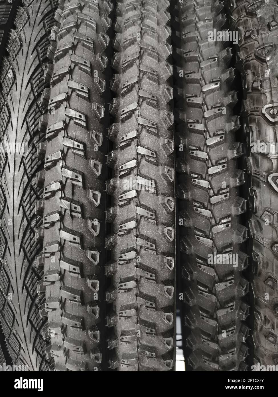 Bicycle tires of different tread patterns Stock Photo - Alamy