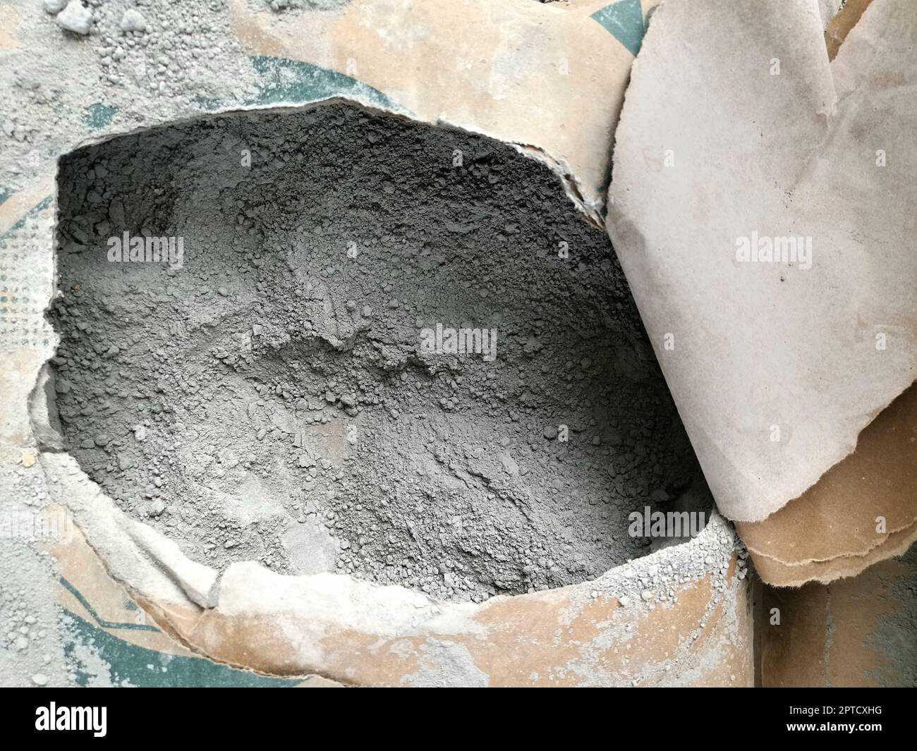 cement powder in bag before mix to concrete Stock Photo - Alamy