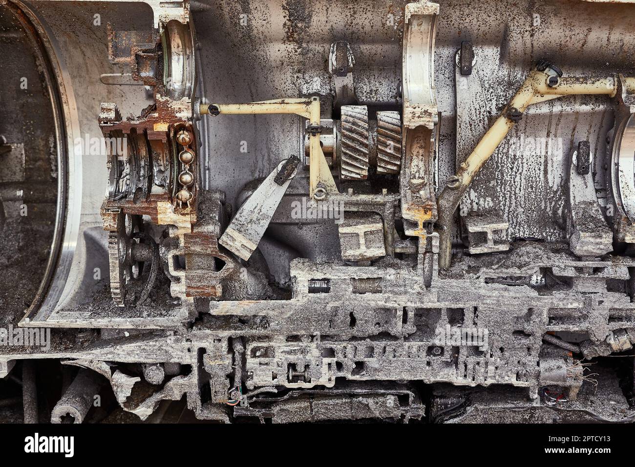 Car engine and gearbox cross section cut in half to display engineering ...