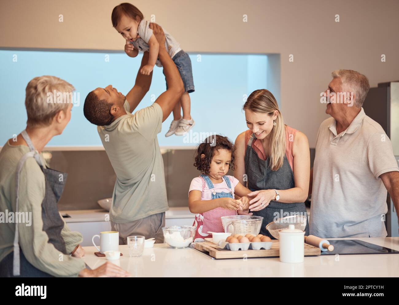 Parents cook child play hi-res stock photography and images - Alamy