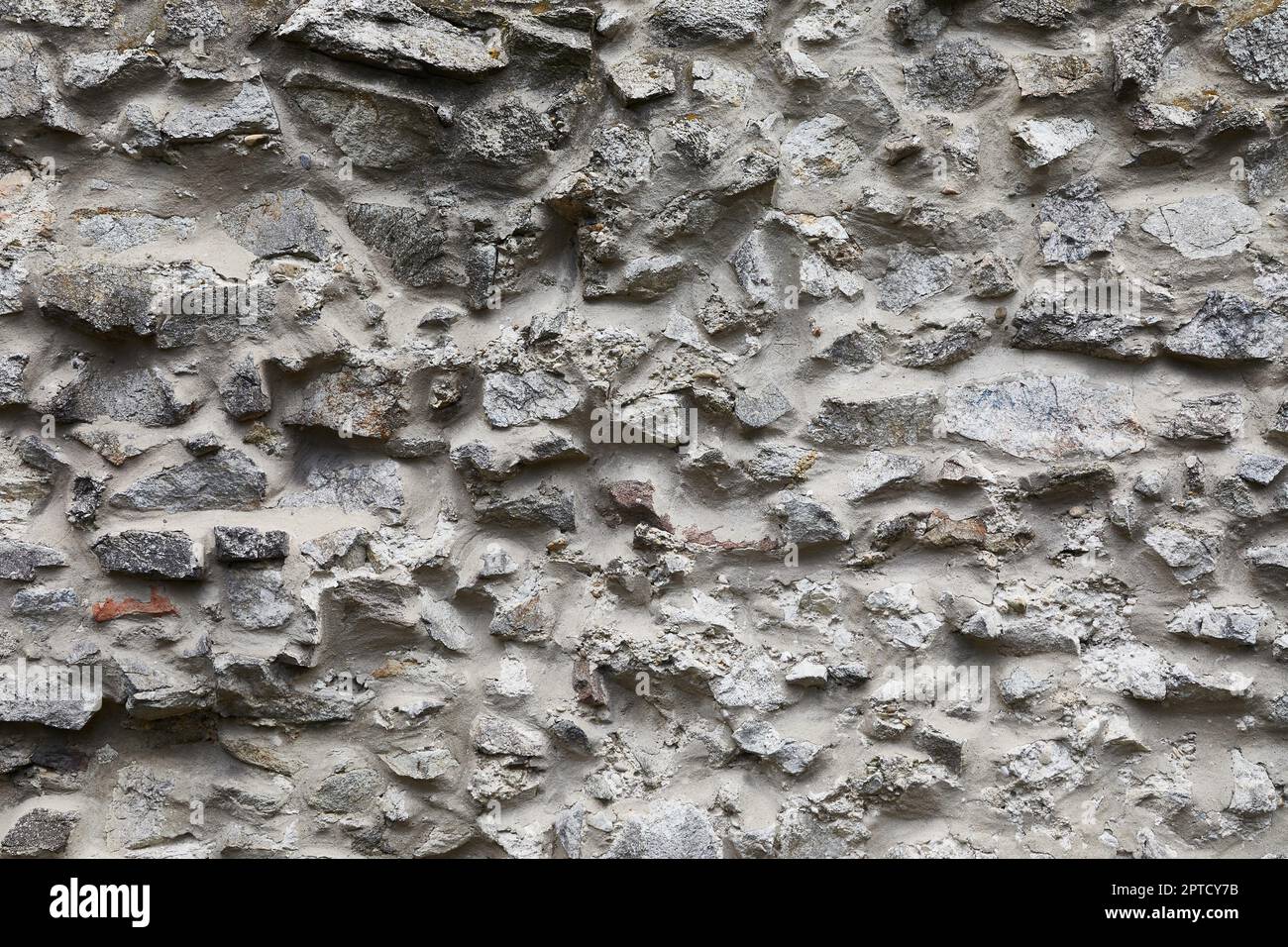 Old stone wall texture rough edges Stock Photo - Alamy