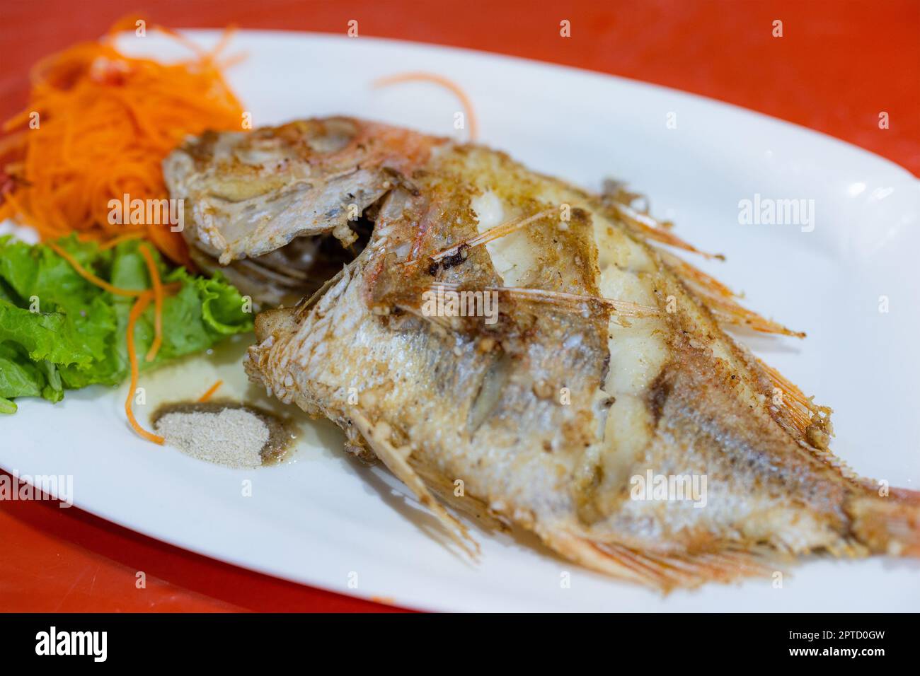 Grill fish dish in restaurant Stock Photo - Alamy