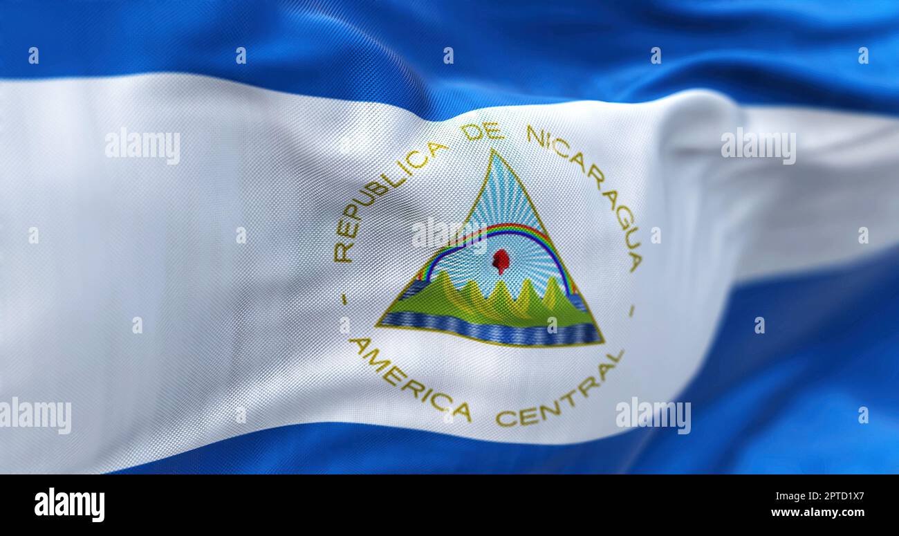 Close-up view of the Nicaragua national flag waving in the wind. The Republic of Nicaragua is a ...