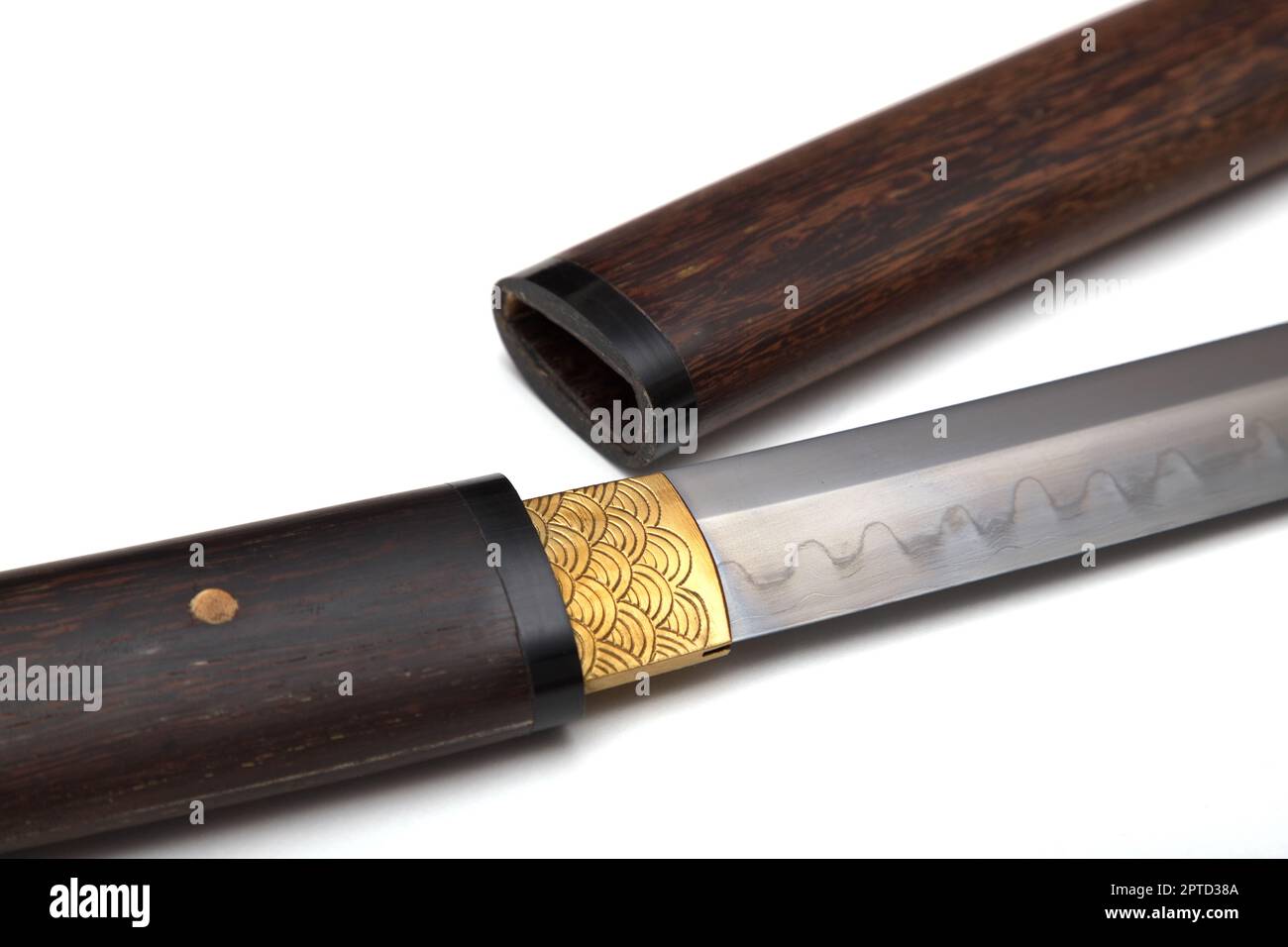 Close-up of a Japanese sword with a handle and a wooden sheath, called ...