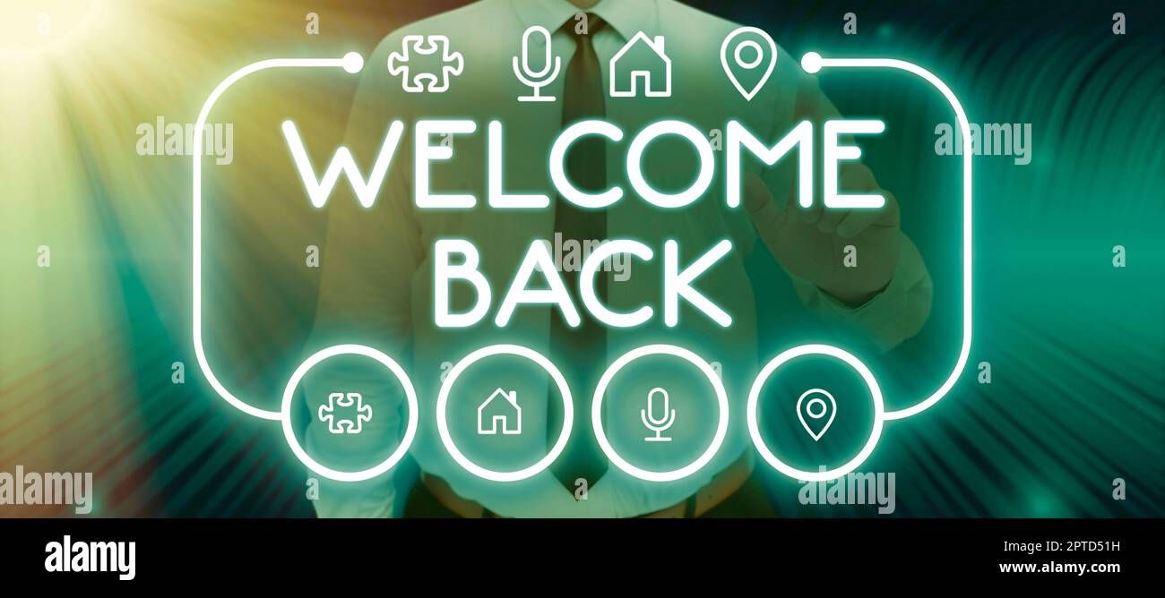 Sign displaying Welcome Back, Word Written on Warm Greetings Arrived ...