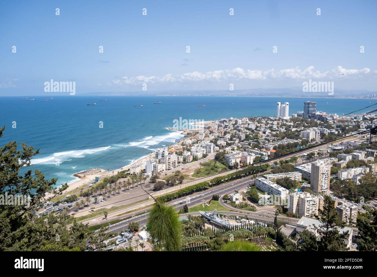 Haifa, Israel, April 06, 2023: Cable car cabins move from the lower ...