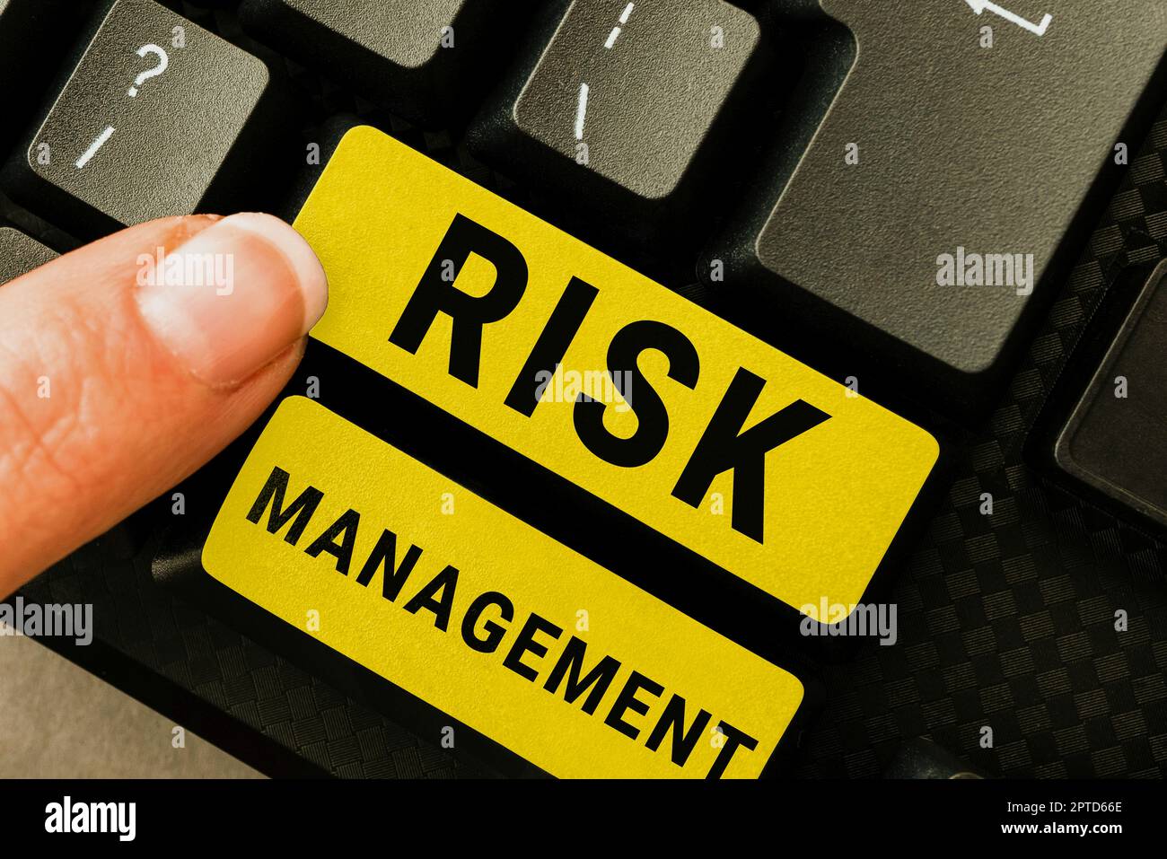 Text caption presenting Risk Management, Business approach assessing ...